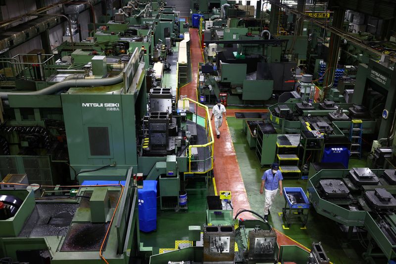 Japan's factory growth slows as cost pressures surge, PMI shows
