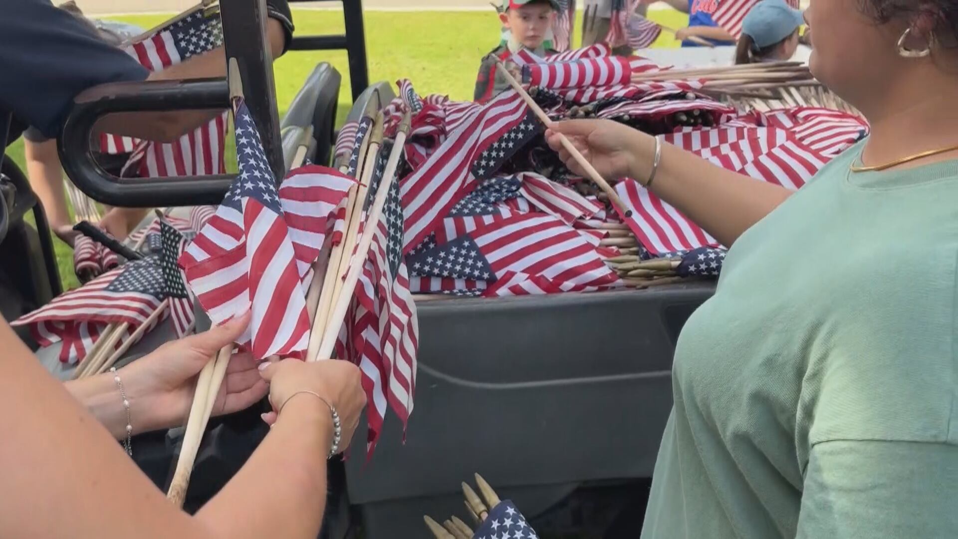 Volunteers gather at Biloxi National Cemetery to retrieve 27,000 ...