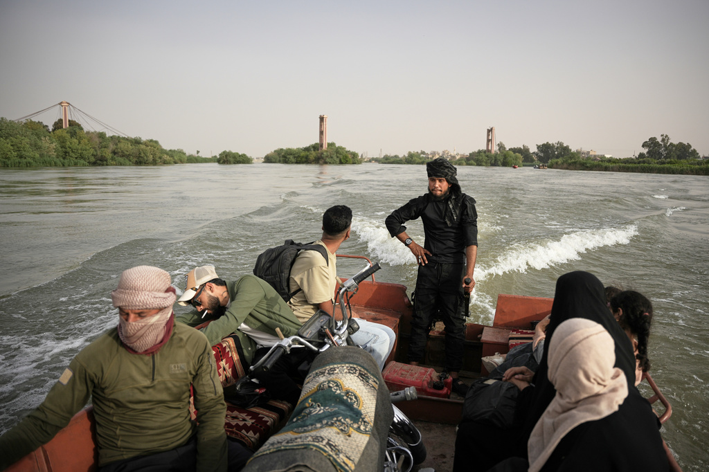 Photos of rare Euphrates River floods in Syria