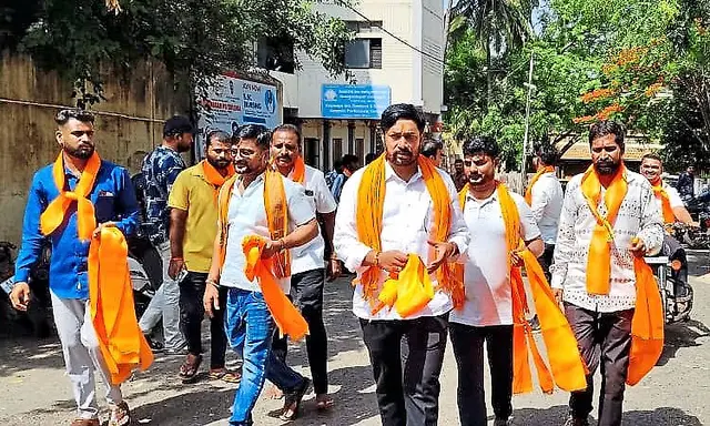Activists distribute saffron shawls to students in Hubballi protesting ...