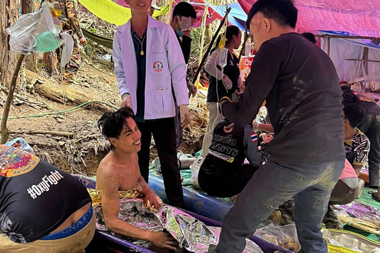Rescuers search for alternative route to reach two missing in flooded ...