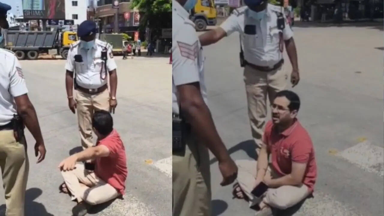 'My wife is pregnant': Furious Bengaluru man sits on road as traffic ...