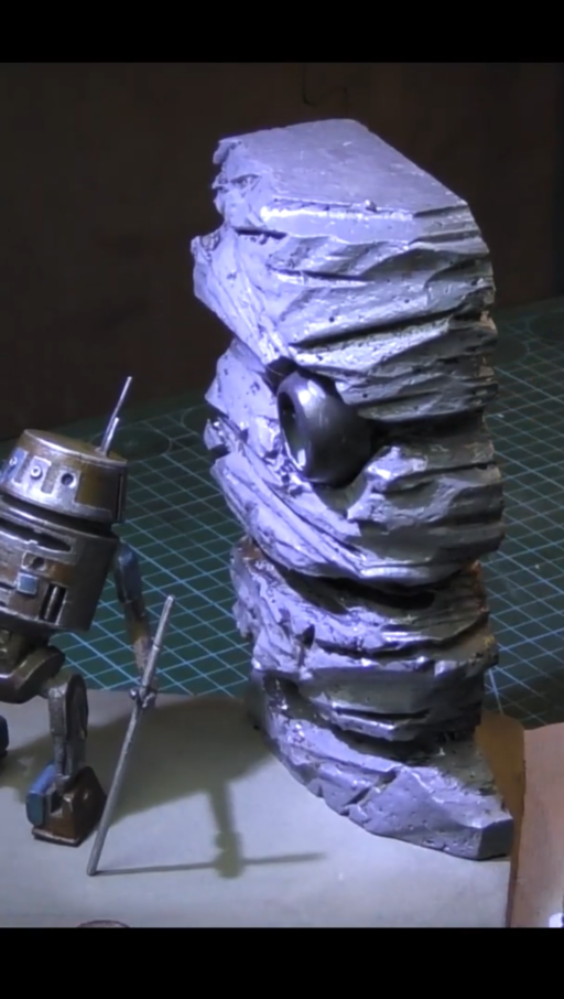 Creative Mandalorian droid mashup for collector displays