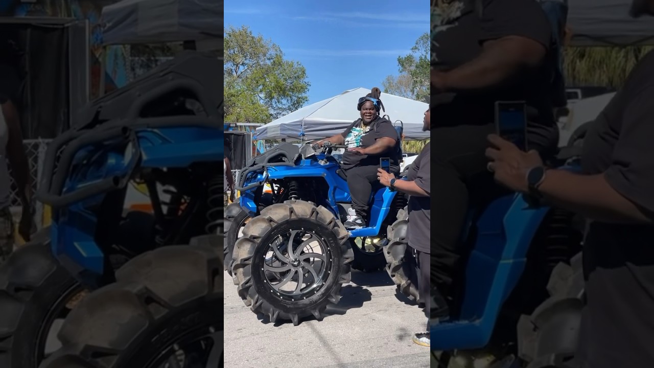 Magic Boys Riding thru the Block Party in BIG ATV’s