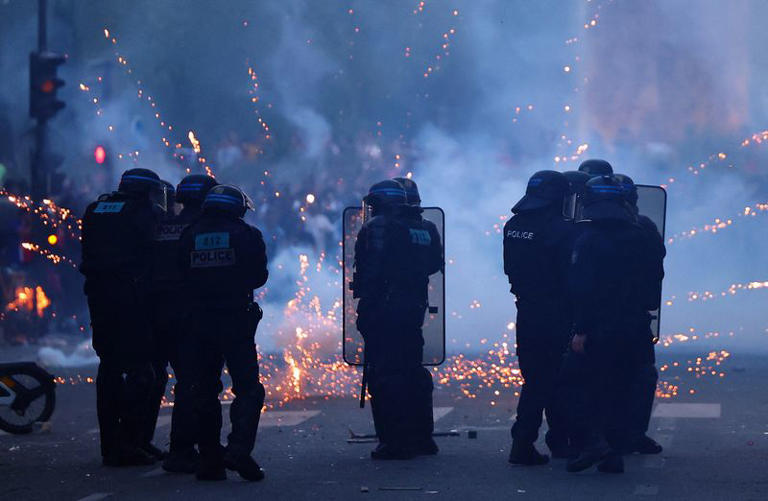Two hundred hurt in post-game violence as Paris hails second Champions ...