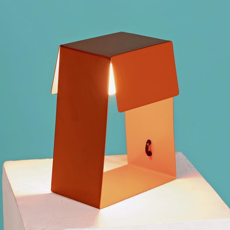 These handcrafted lamps combine architectural folds with soft ambient ...