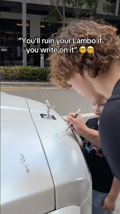 Writing my subscribers' names on my Lambo!