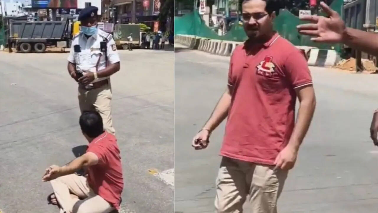 Man sits on road as pregnant wife 'trapped' in traffic jam after VIP ...