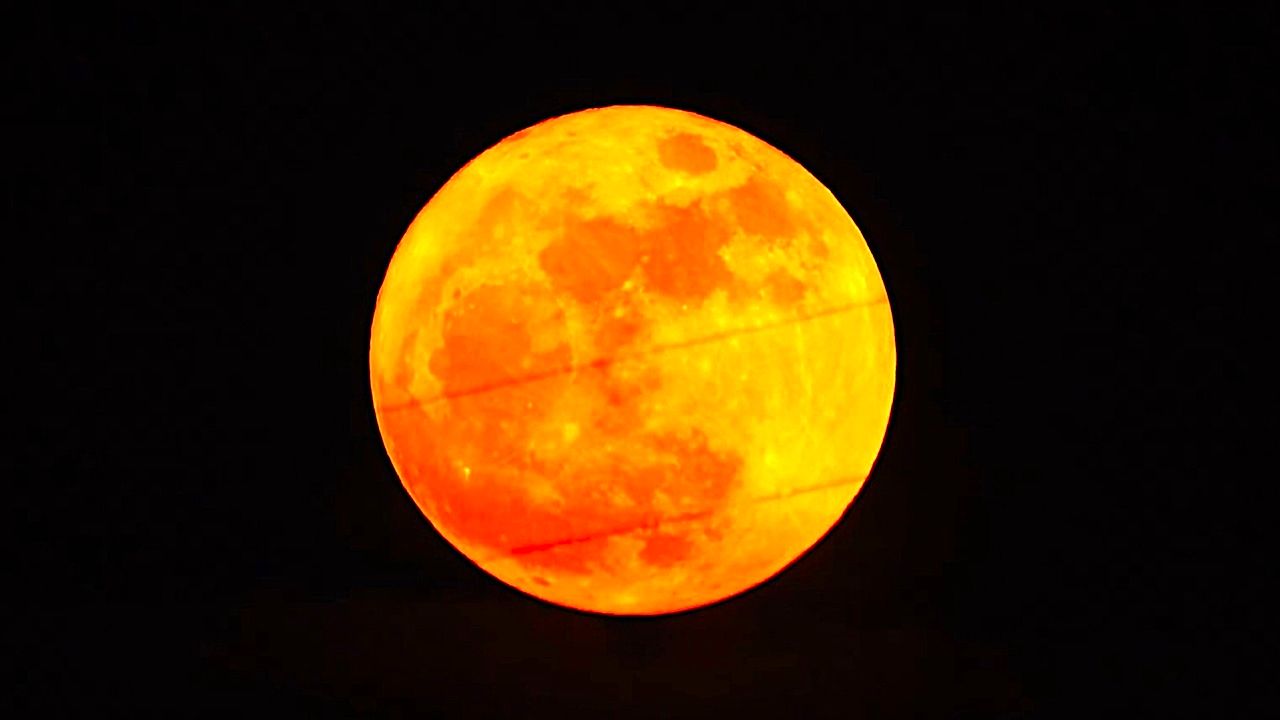 Exceptionally rare blue micro moon lights up night sky over China