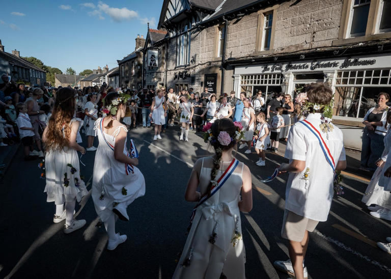Pictures: Peak District marks ancient tradition as 'king' decked in ...