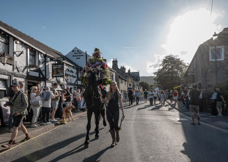 Pictures: Peak District marks ancient tradition as 'king' decked in ...
