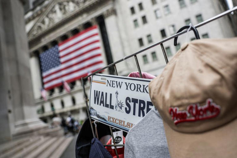 Wall St. near record levels as AI optimism tempers war concerns; Nvidia ...