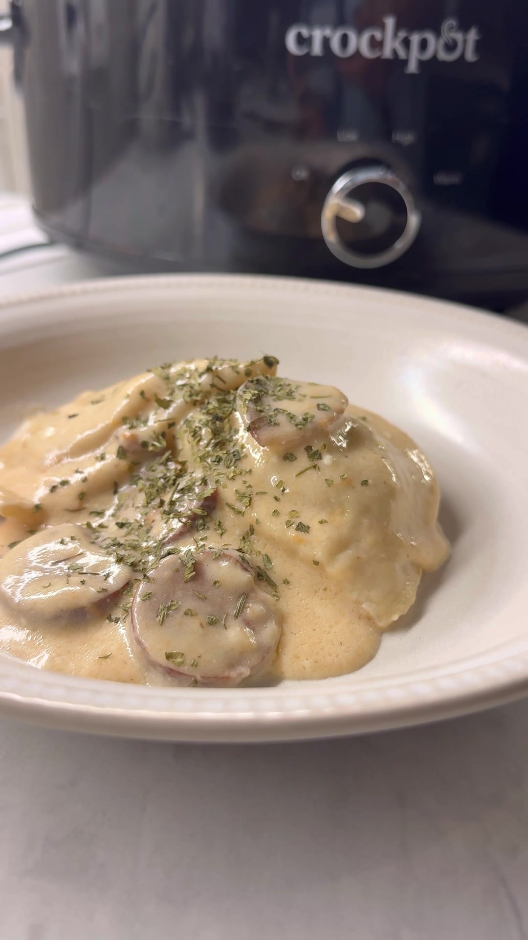 Easy crockpot creamy scalloped potatoes loaded with fresh herbs for a ...
