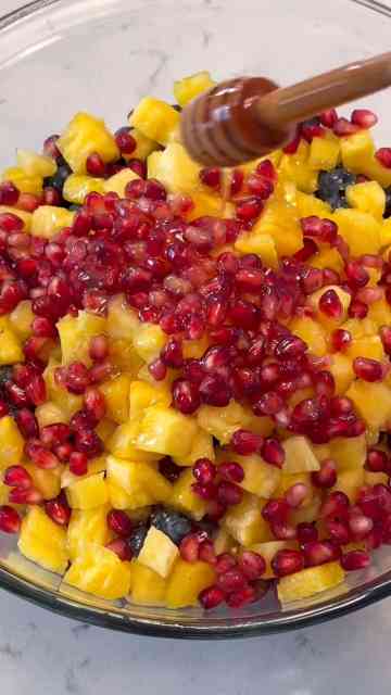 Creating a stunning fruit salad with fresh, seasonal fruits