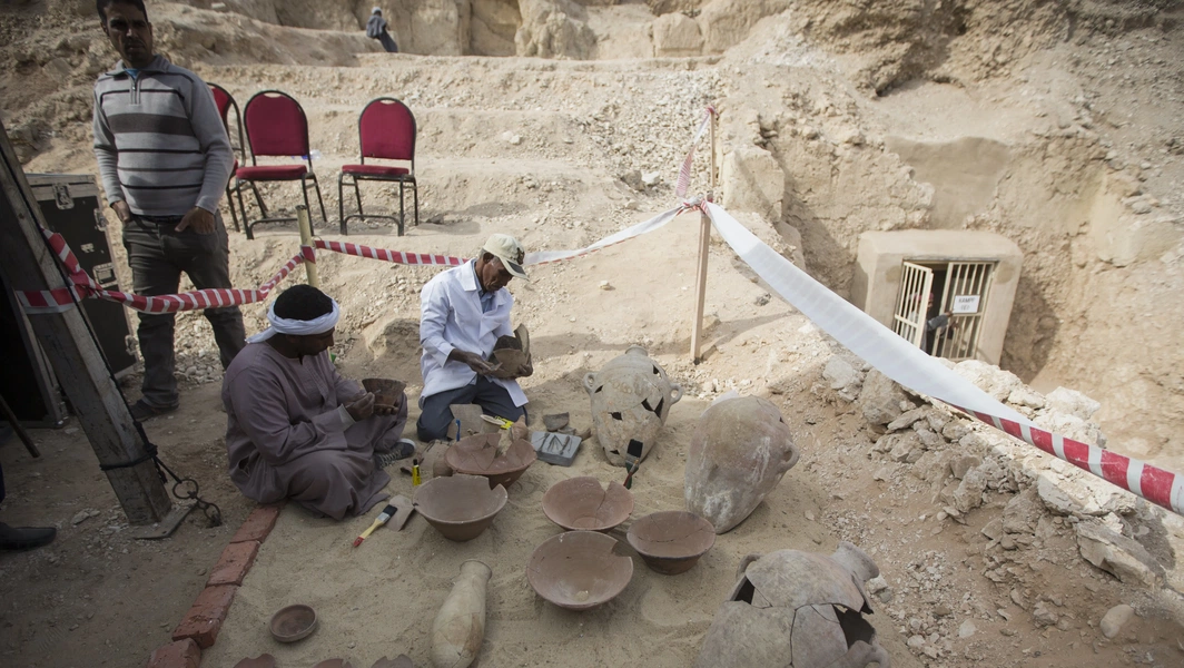 Archaeologists uncover 22 coffins of temple singers in Luxor tomb