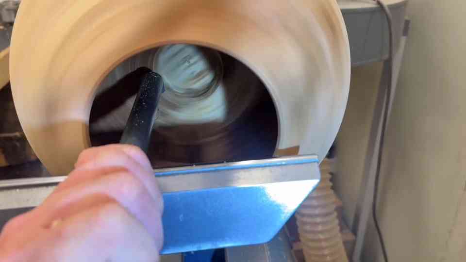 Watch this ordinary log reveal the flamed beech hiding inside