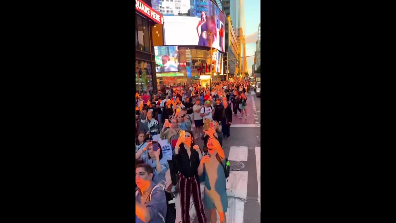 Glorious sunset casts red and orange hues through New York skyscrapers