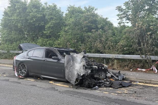 Car fire rips through BMW before rescue services attend the scene