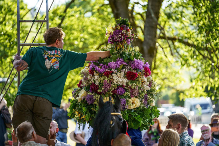 Pictures: Peak District marks ancient tradition as 'king' decked in ...