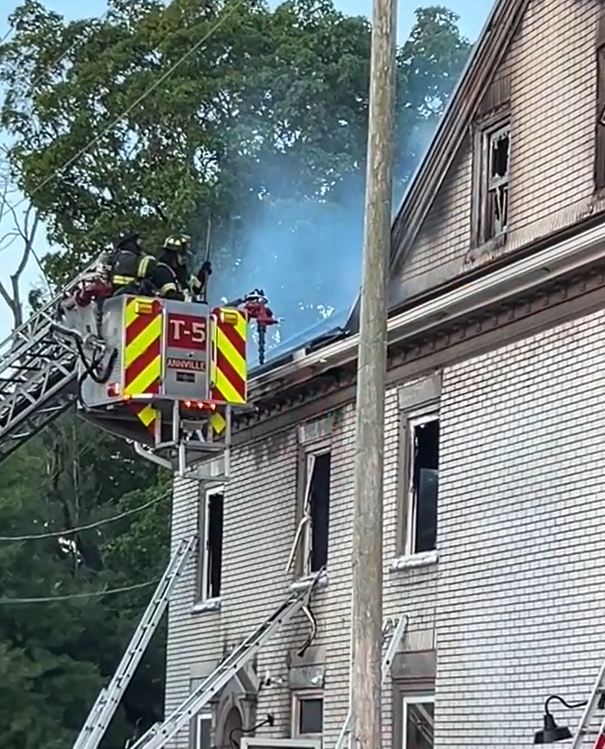 Fire rips through bar and grill, prompts school delay