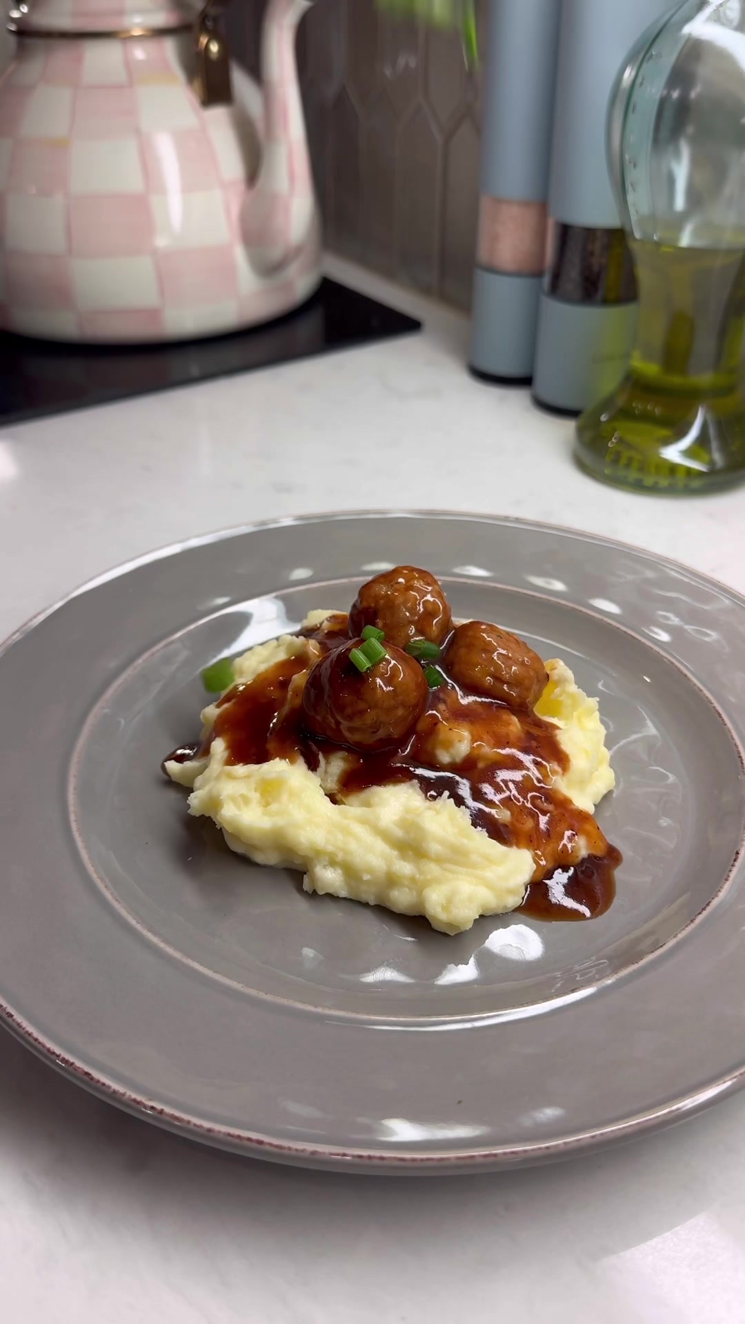 Homemade mashed potatoes and meatballs smothered in gravy for a cozy ...