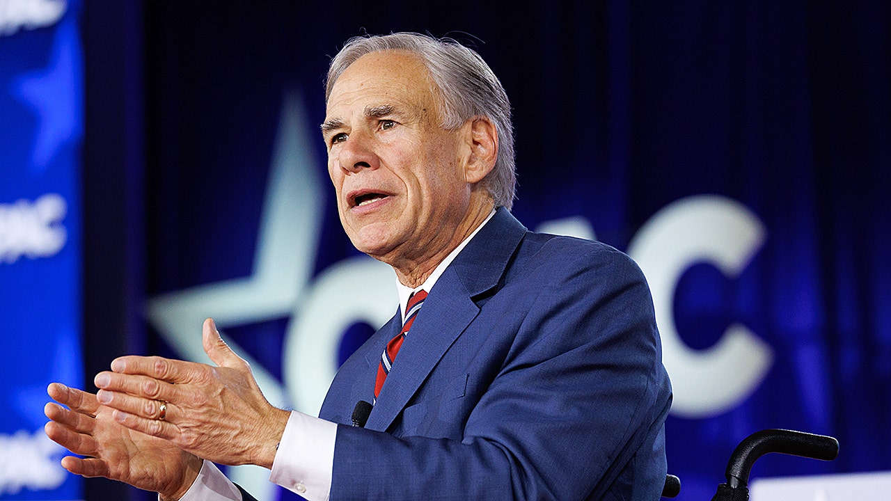 Greg Abbott posts AI image of himself dunking in Spurs jersey to troll ...