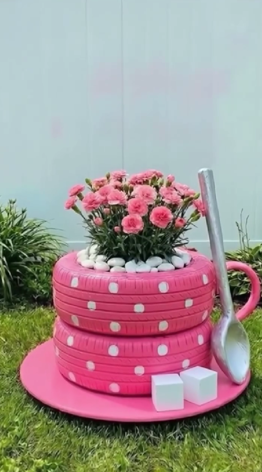 Creative teacup tire planter for garden decoration