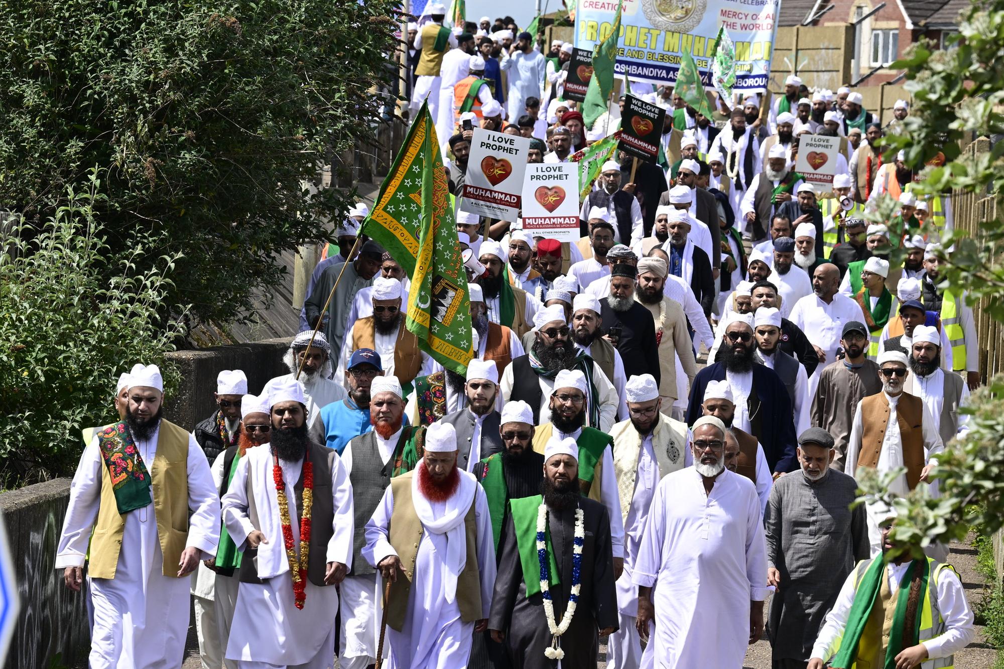 Thousands attend Muslim peace parade through streets of Peterborough to ...
