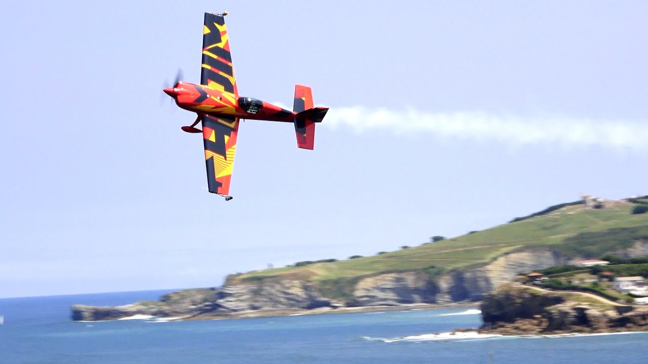 Watch jets rip along the cliff edge - then the flybys get dangerously close