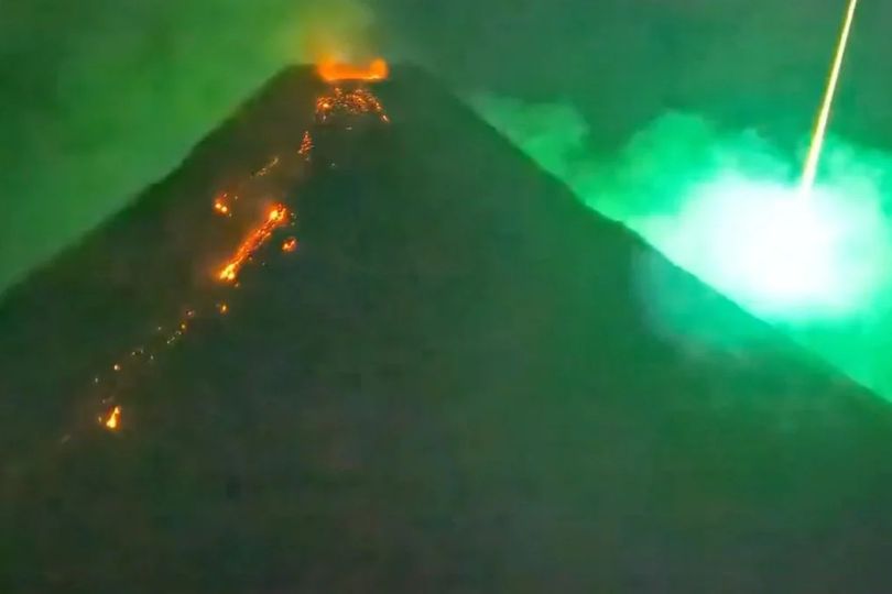Space boffin breaks silence on 'UFO' spotted soaring out of erupting ...