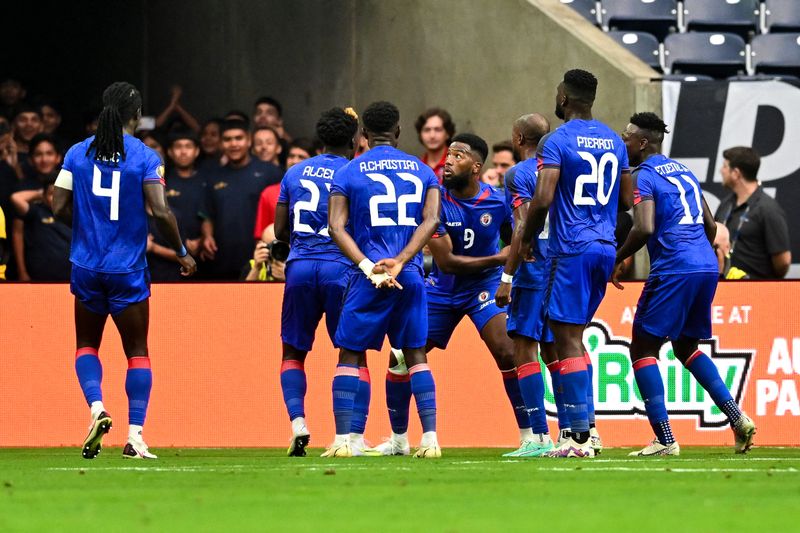 Soccer-Haiti end 52-year World Cup wait and aim to lift nation in turmoil