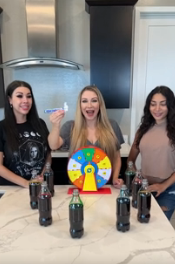Girls react to winning in a prize game