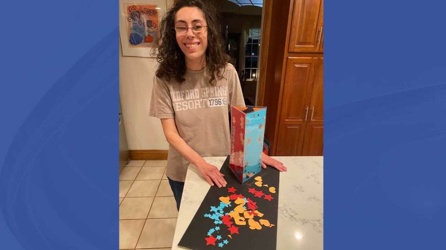 Ohio artist who is legally blind turns vision into success