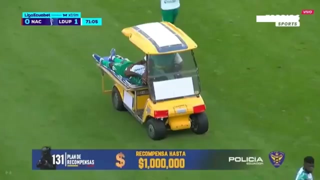 Football player run over by medical staff removing injured teammate