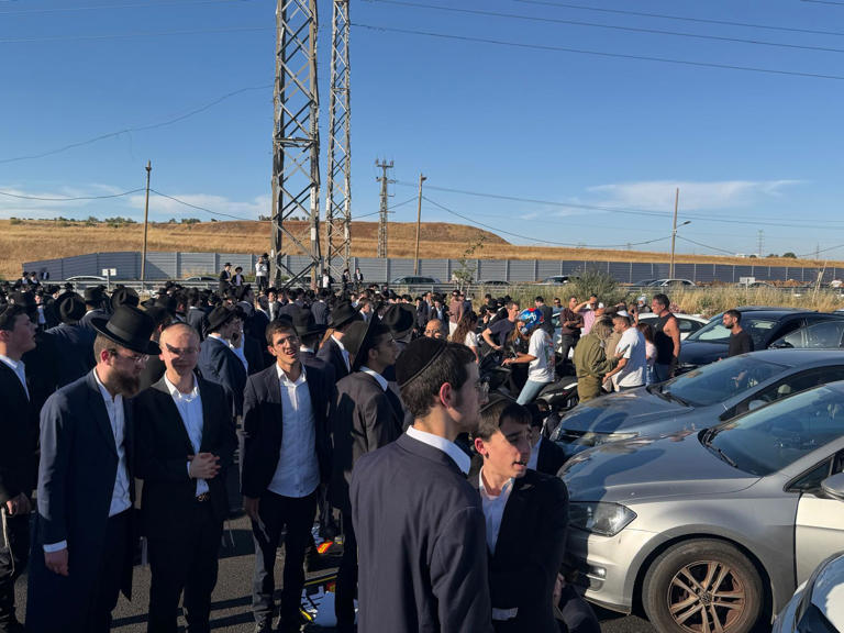 Ultra-Orthodox protesters hold anti-draft protests, block train tracks ...