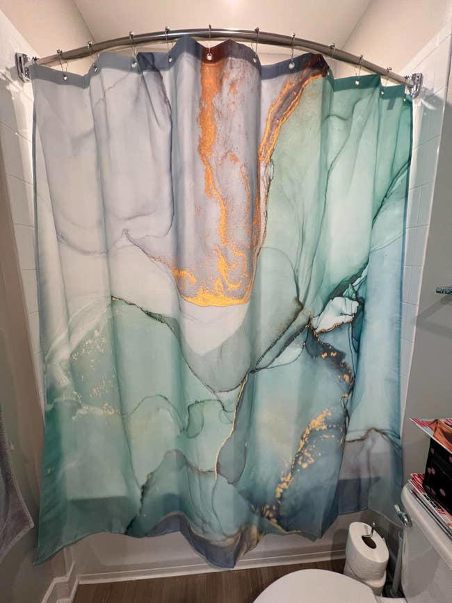 If your shower curtain has seen better days, here's 32 replacement options