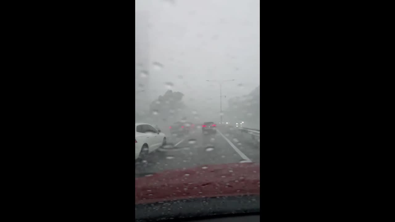 Storm causes trees to fall along road in Kuala Lumpur