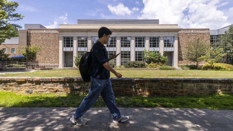 How will new limits on grad-school loans affect prospective students in NC?
