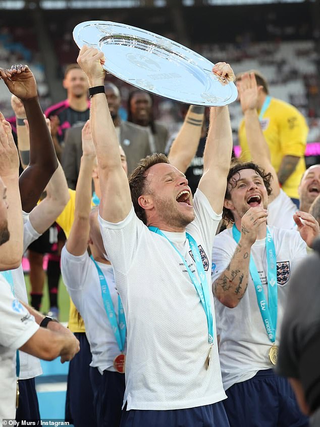 Shirtless Olly Murs shows off his ripped physique to celebrate raising ...