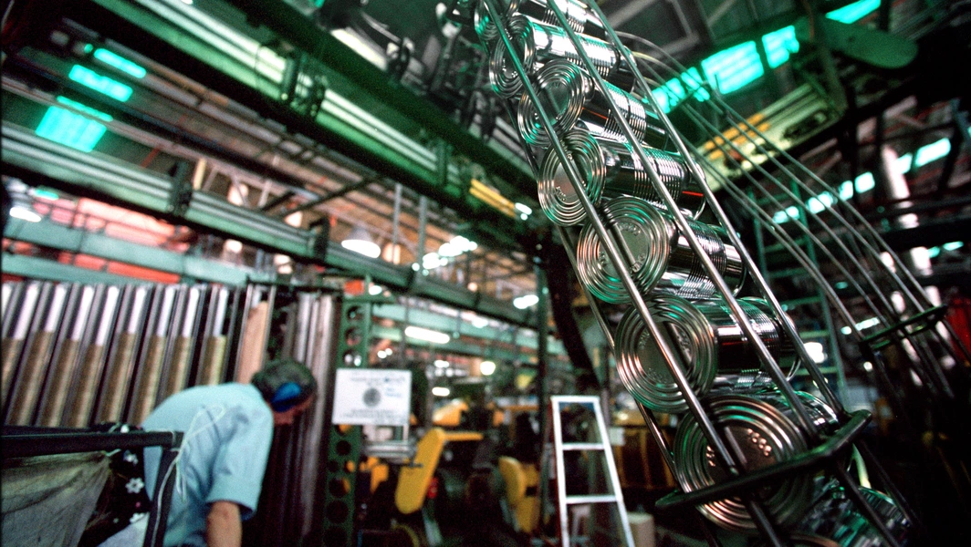 Australia's May manufacturing PMI revised up as job ads rise