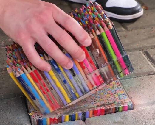 Turning road damage into street masterpieces