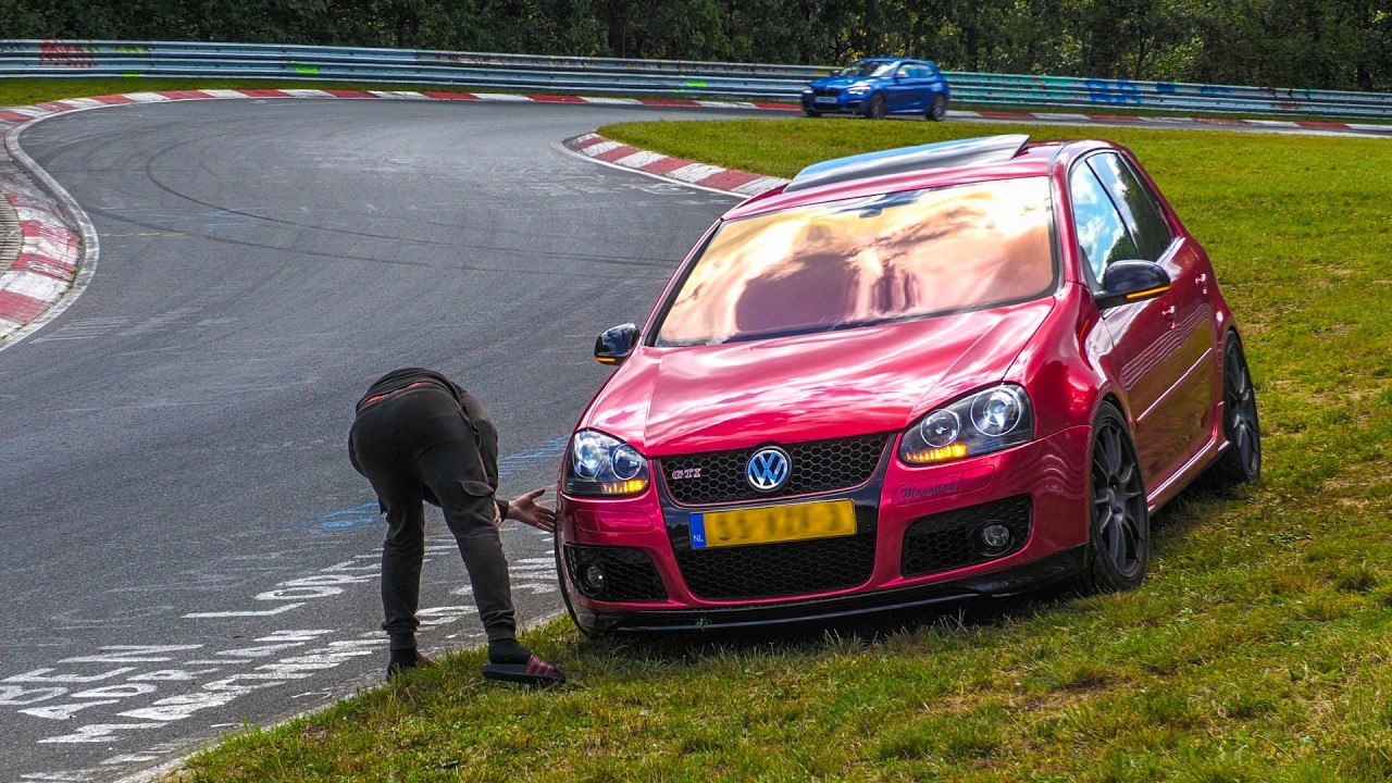 This Driver Dangerously Check His Golf In The Side Track Of Nurgburgring