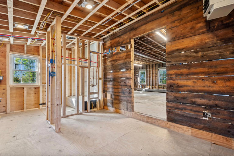 For $579k, an unfinished 1800s carriage house condo