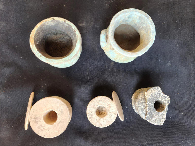 Ancient trove of jewellery and funeral items uncovered at cemetery in Cairo