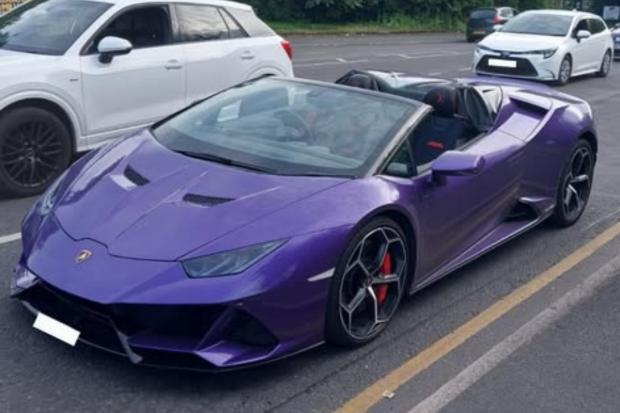 These two shiny supercars were caught driving on wrong side of busy ...