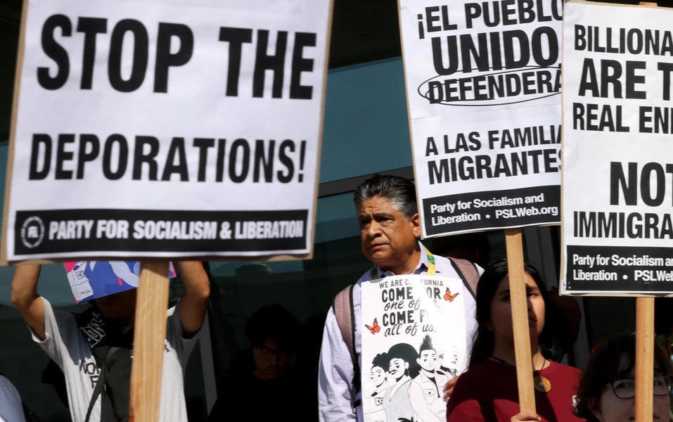 Trump policy forces green card applicants abroad, sparking backlash