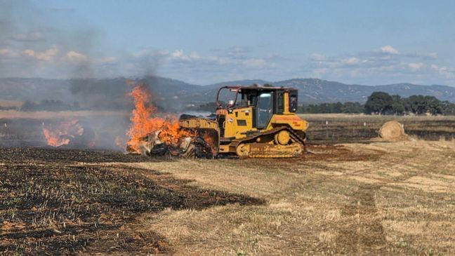 Fire crews stop forward spread of hay field fire near Honcut in Butte ...