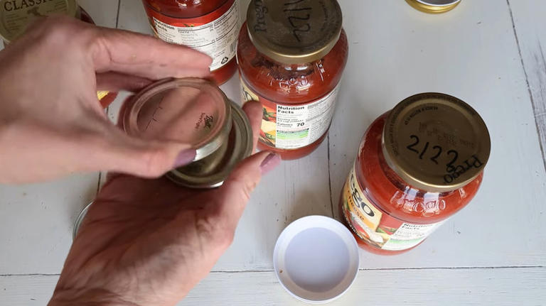 Don't toss old jar lids — make adorable DIY wall decor instead