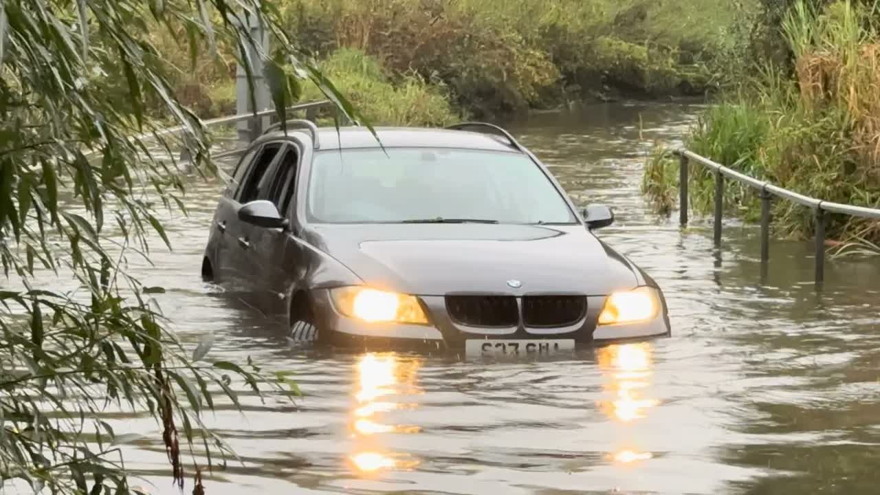 BMW driver really thought headlights were enough to survive a flood