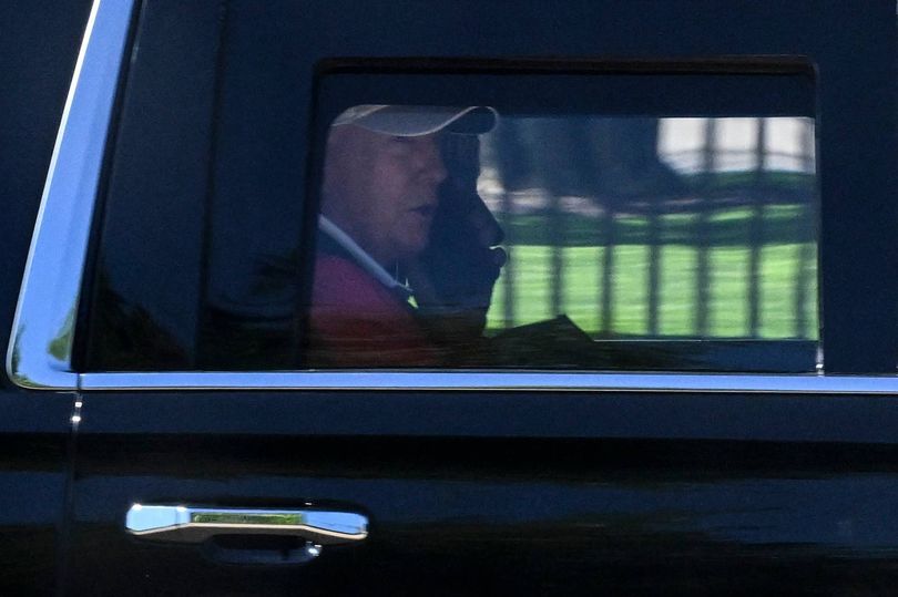 Donald Trump rocks up at golf course with mystery blonde aide after ranting